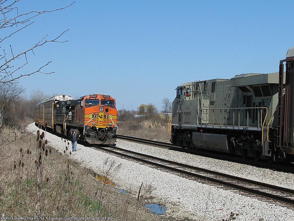 BNSF 5342 NS 171 waits as NS 25G runs by
